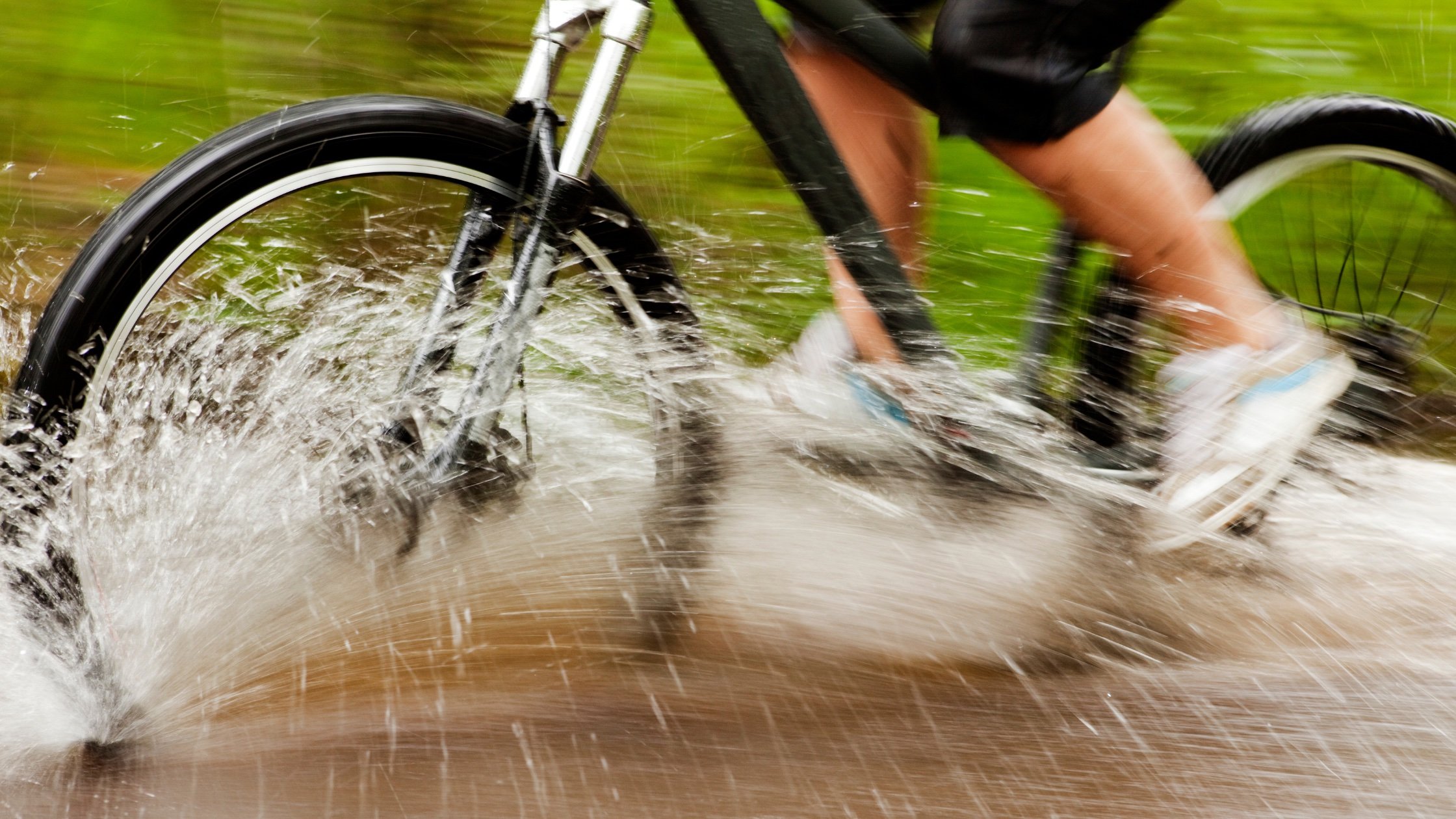What happens if it rains during my bike tour?